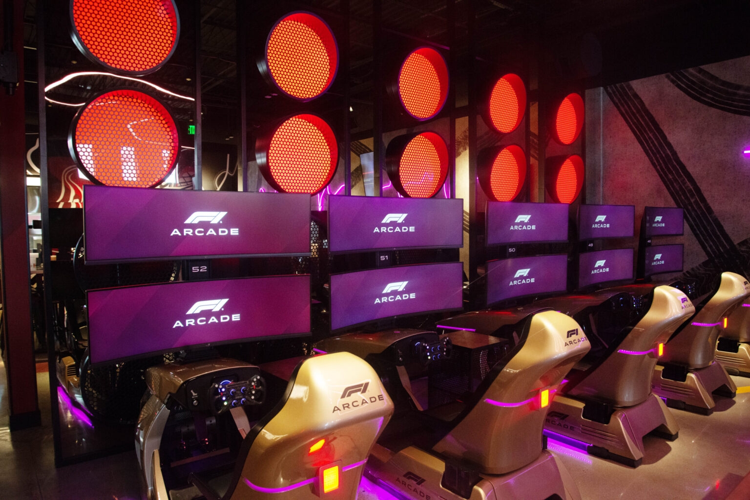 Inside Denver’s new F1 Arcade – full of racing simulators, exposed brick and ... Blucifer ...
