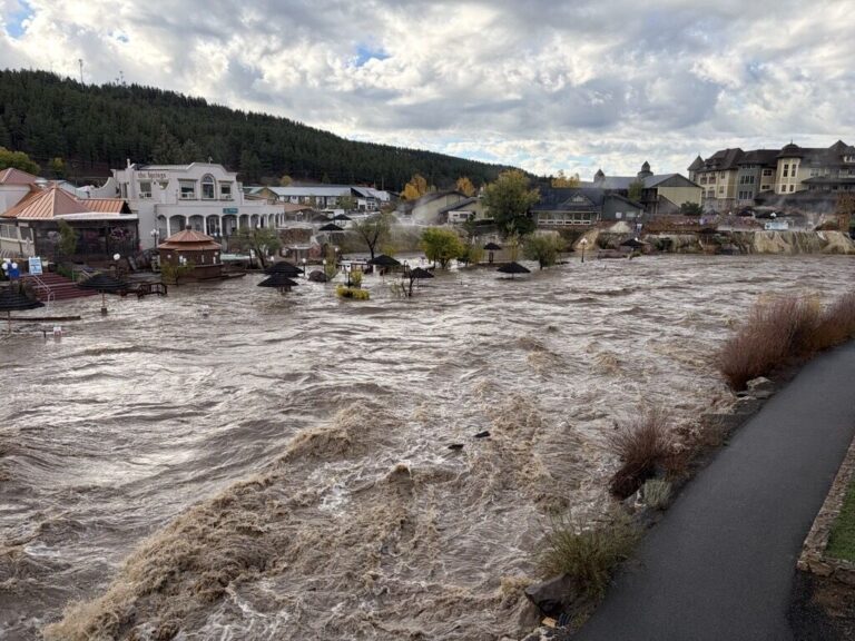 Hot spring resort seen underwater as flooded river hits 55-year peak in ...
