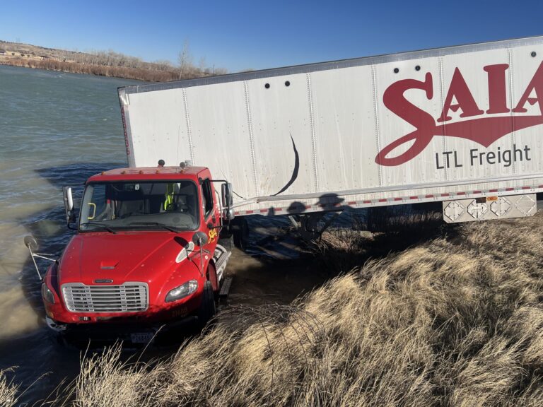 Semi truck blown off road and into lake amid gusty conditions in ...